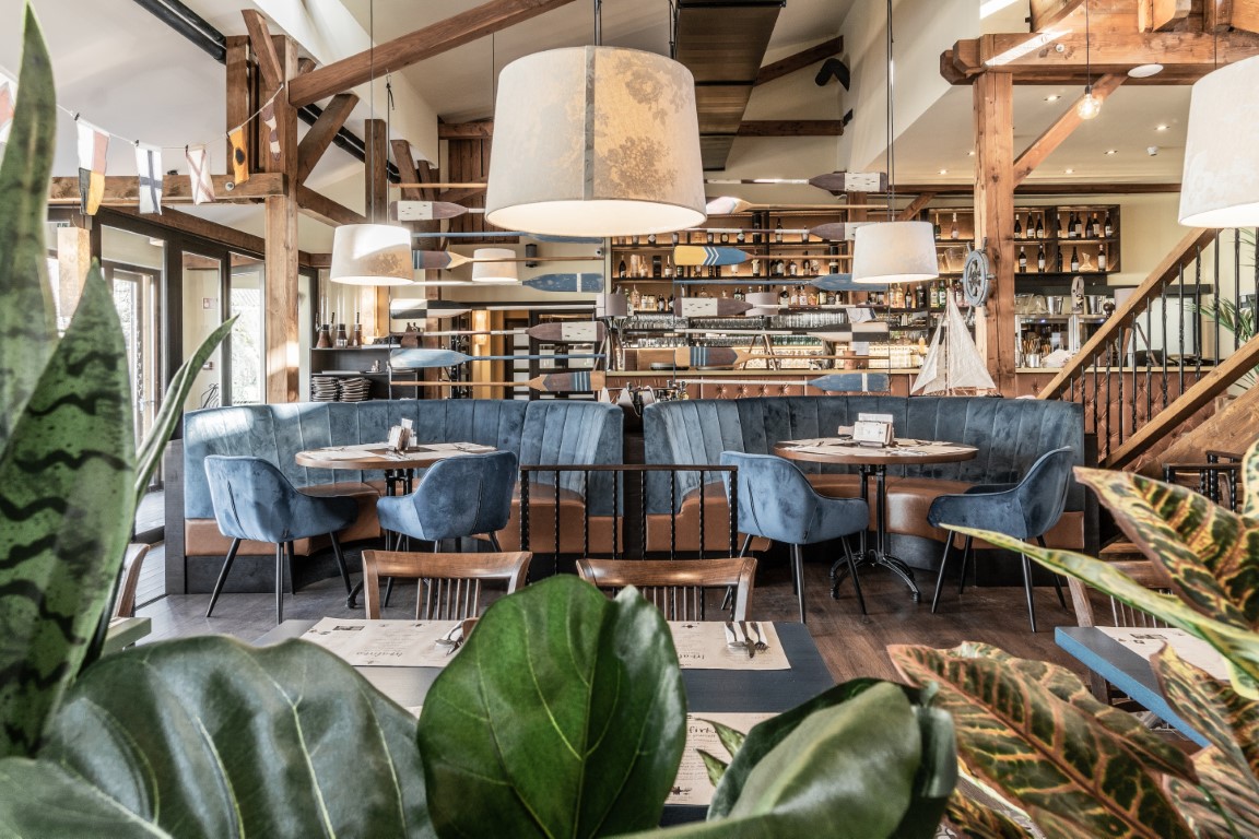 Romantic waterfront restaurant with mesmerizing interior design ...